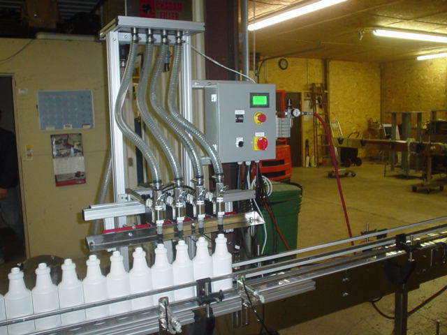 Gravity Filler Machine | Natronics Equipment